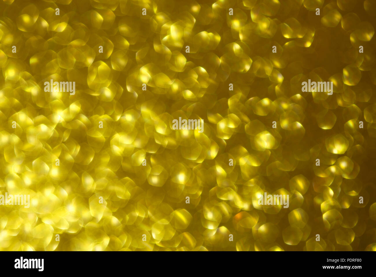 Shiny gold abstract background with a bokeh effect Stock Photo - Alamy