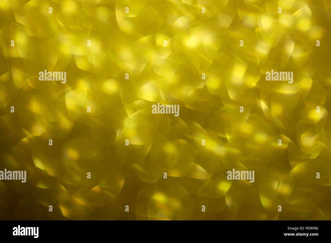 Shiny gold abstract background with a bokeh effect Stock Photo - Alamy
