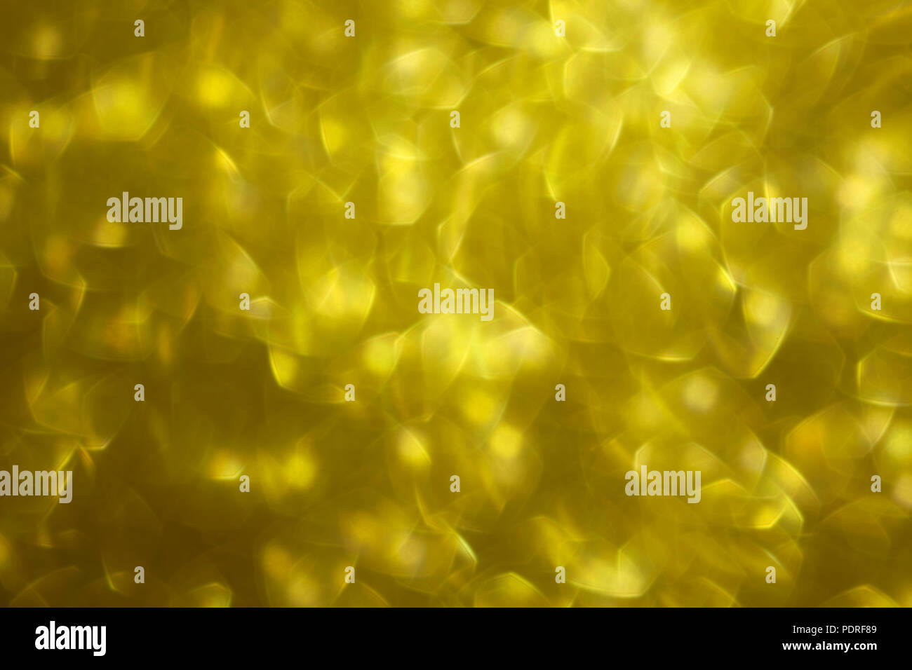 Shiny gold abstract background with a bokeh effect Stock Photo - Alamy