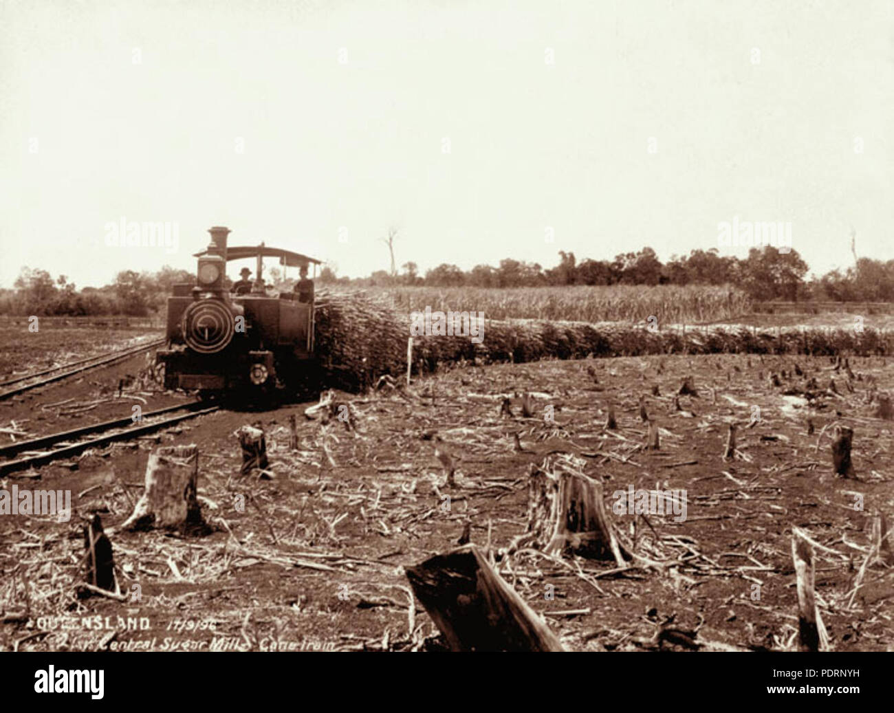 118 Queensland State Archives 5094 Central Sugar Mill with cane train ...
