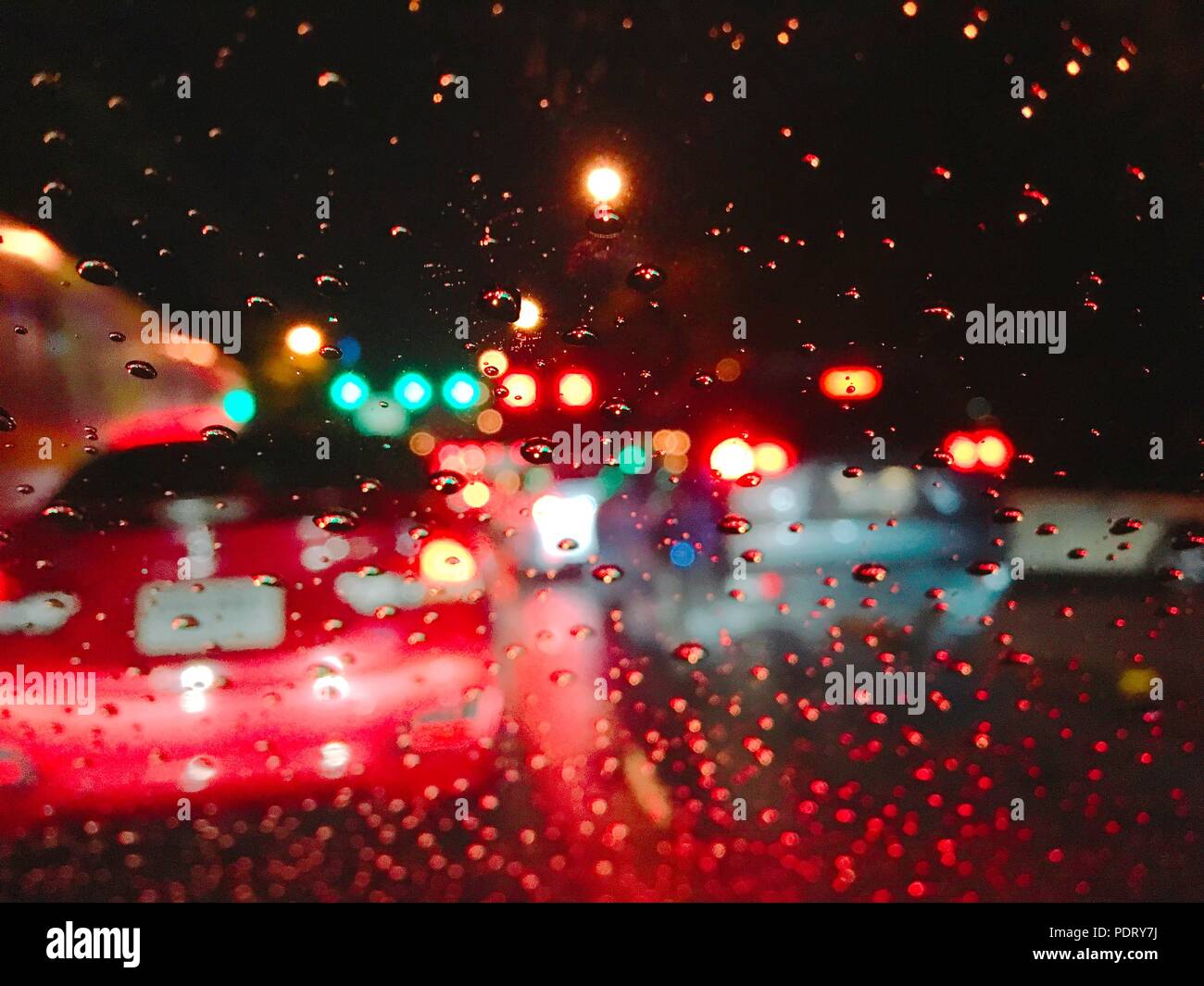 rain night traffic jam in Bangkok blur sleepy vision of doze off driver ...