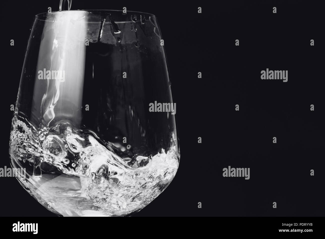 Pouring water in glass close hi-res stock photography and images - Alamy
