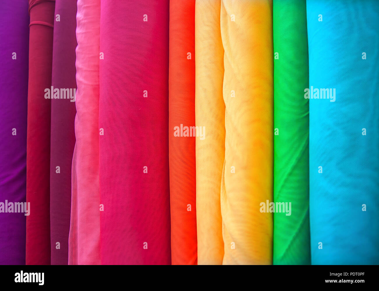 Fabric patterns rolls in a textile shop Stock Photo - Alamy