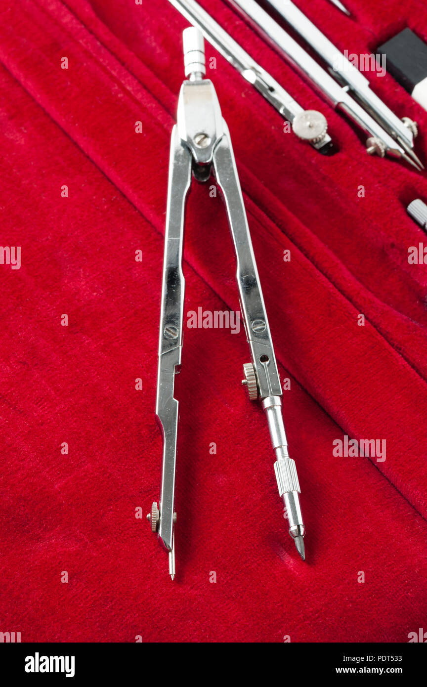 closeup compass (drawing tool) with the box set as background Stock ...