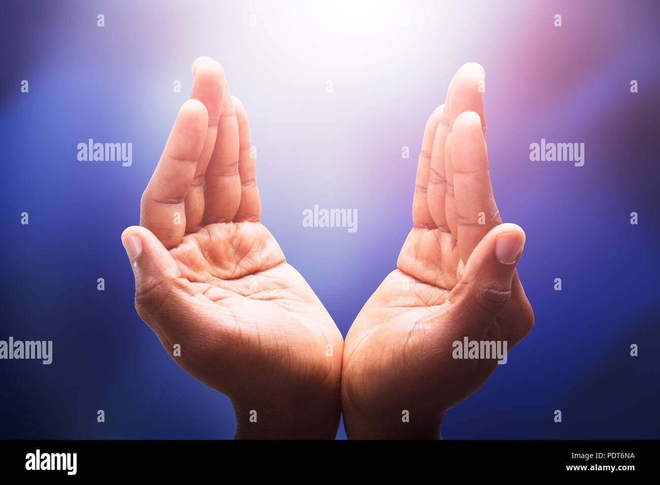 Black praising god hi-res stock photography and images - Alamy