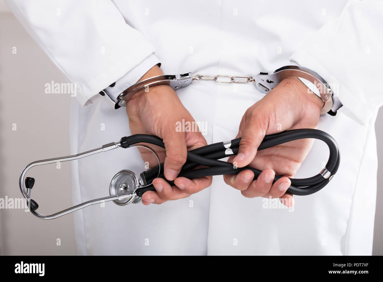 Handcuff hi-res stock photography and images - Alamy