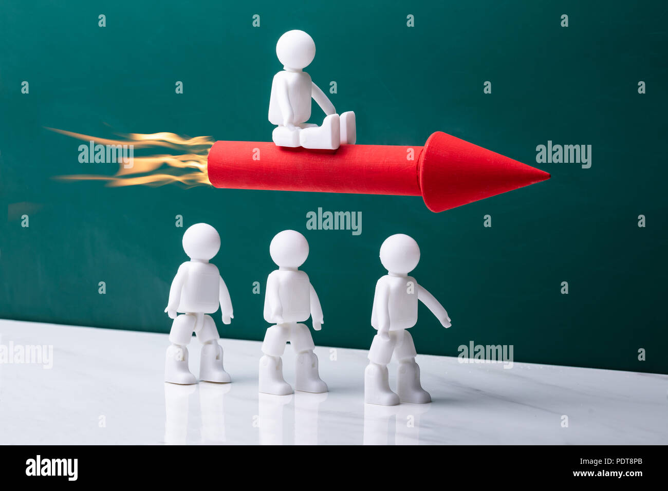 Human Figure Flying Rocket Over Competitors To Achieve Success Stock ...