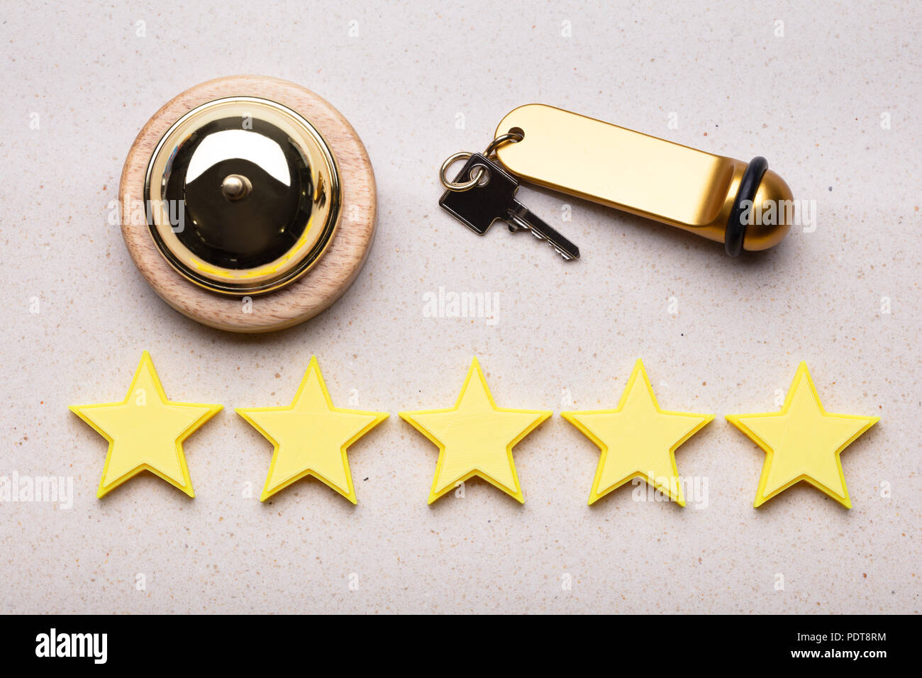 Elevated View Of Service Bell, Hotel Key And Five Star Rating Icon On ...