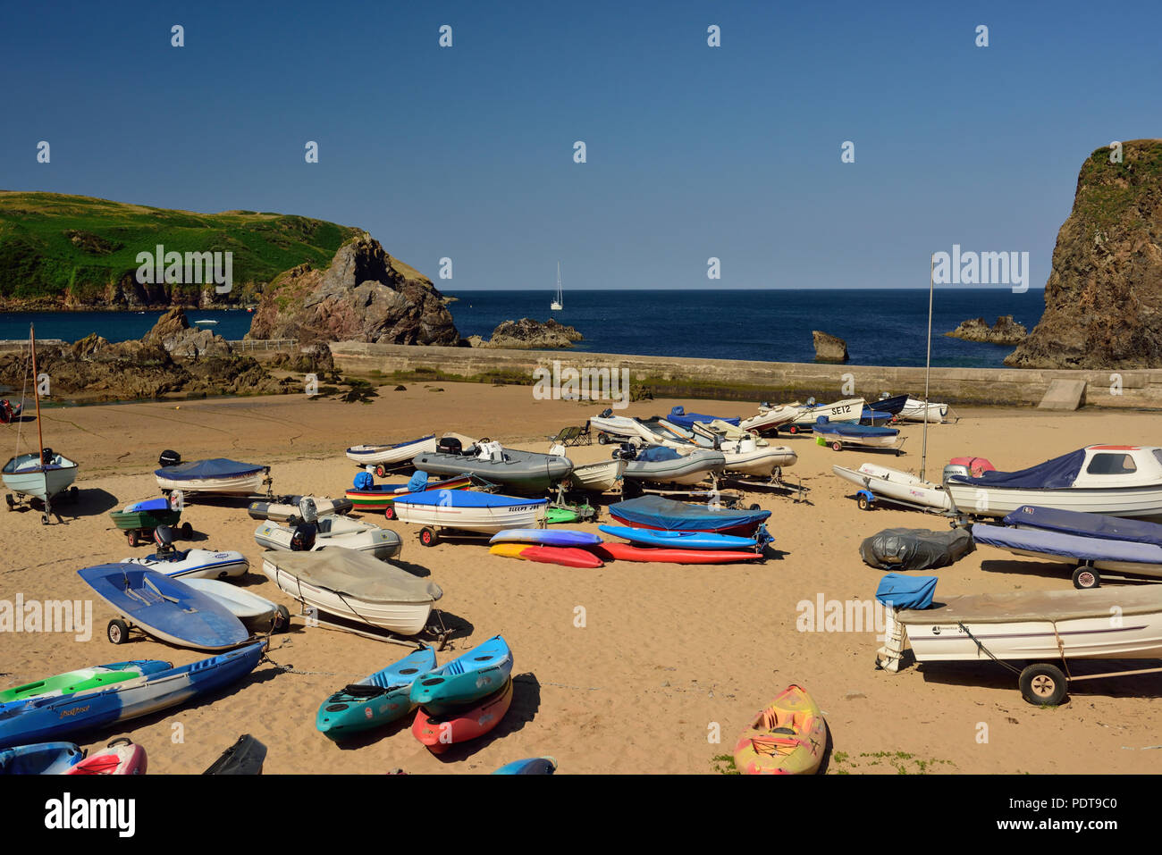 Outer Hope, Devon, looking across Hope Cove towards Bolt Tail Stock ...