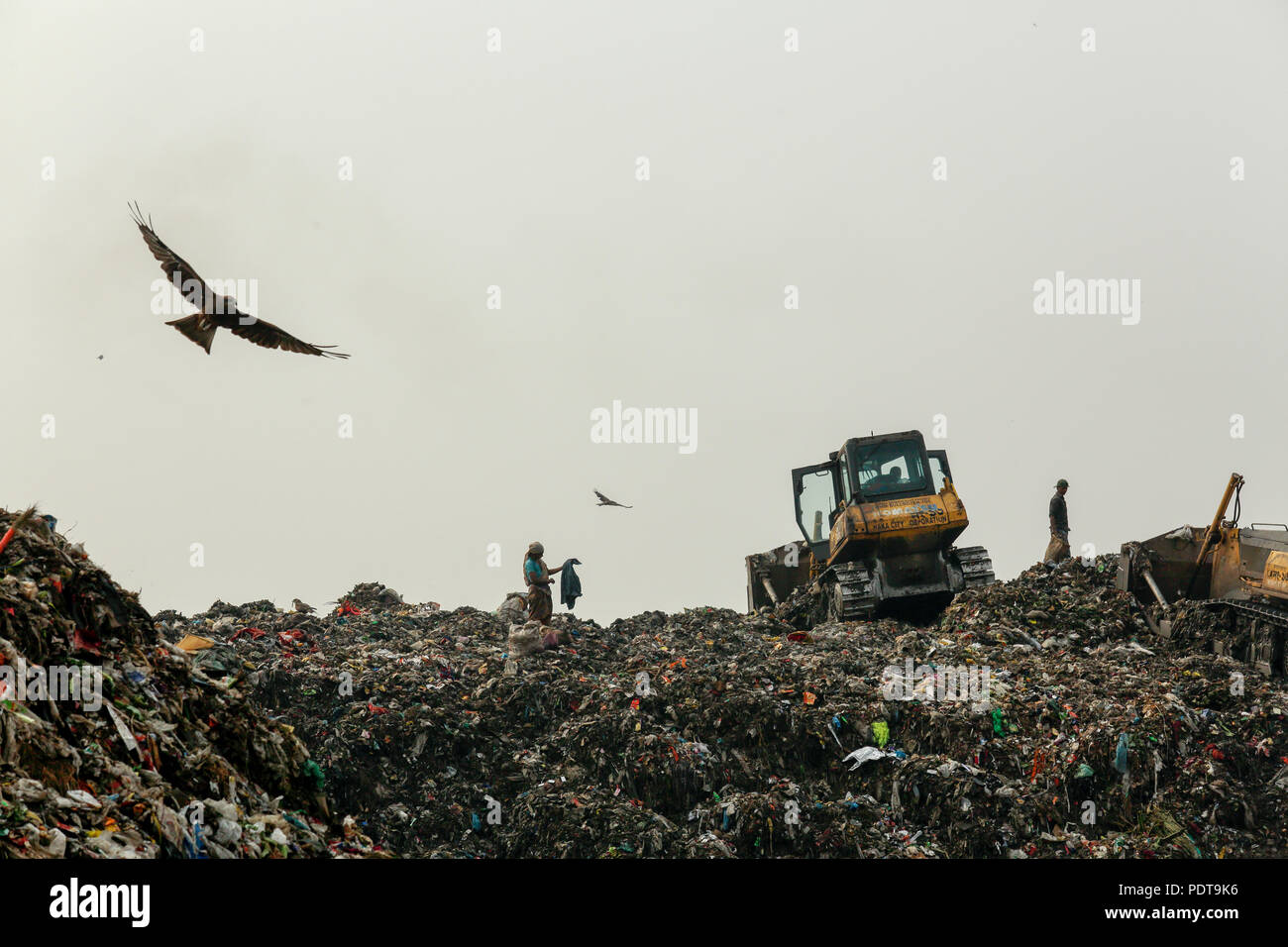 Matuail garbage dump yard in Dhaka, Bangladesh. It received 1500 tones ...