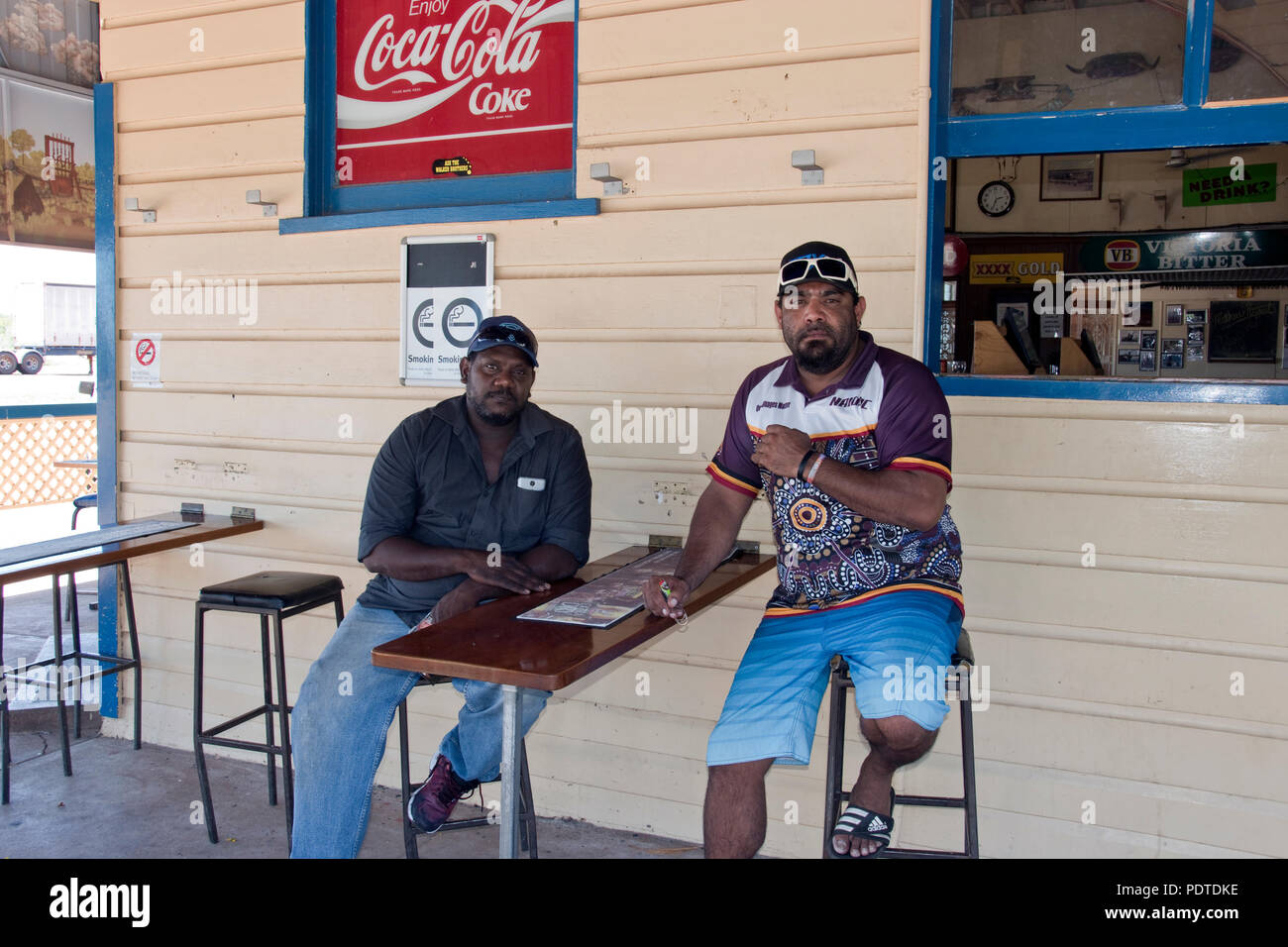 Two aboriginal stockmen, known as ringers in Queensland, sit outside ...