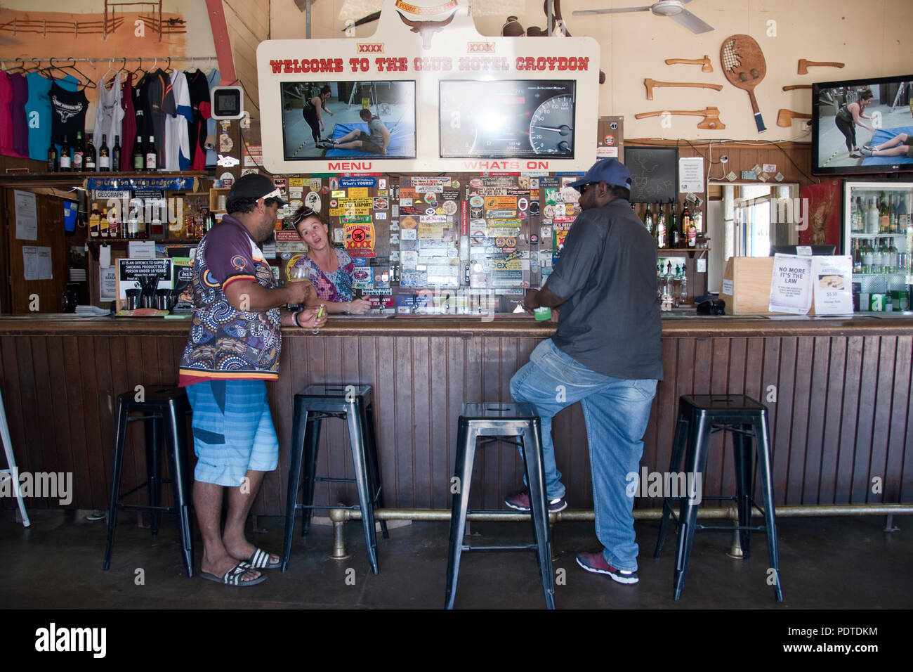 Two aboriginal stockmen, known as ringers in Queensland, drink beer at ...