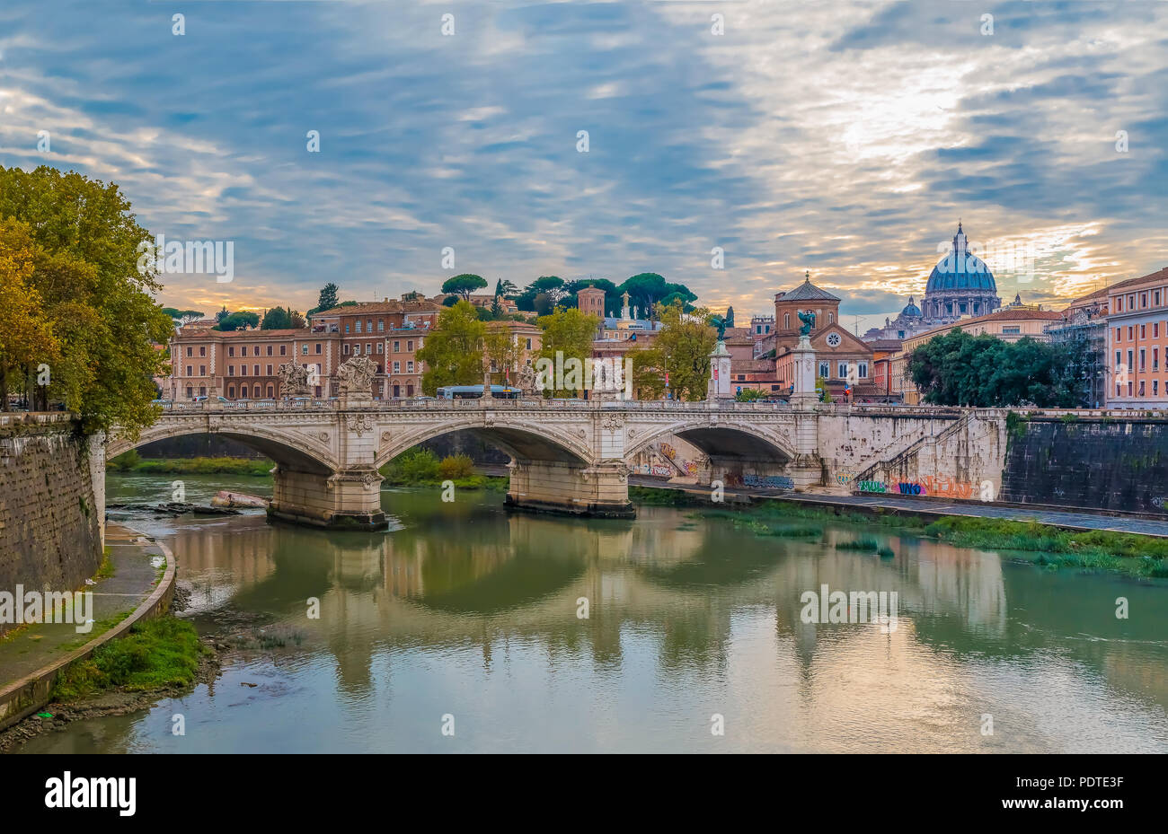 Sunset view of St. Peter’s Basilica in the Vatican and the Ponte Sant ...