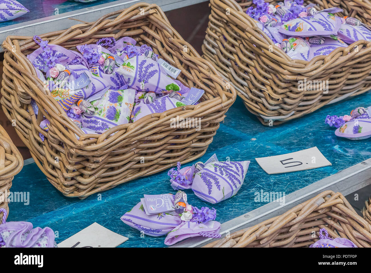 Colorful decorative sachets filled with lavender at market at a market ...