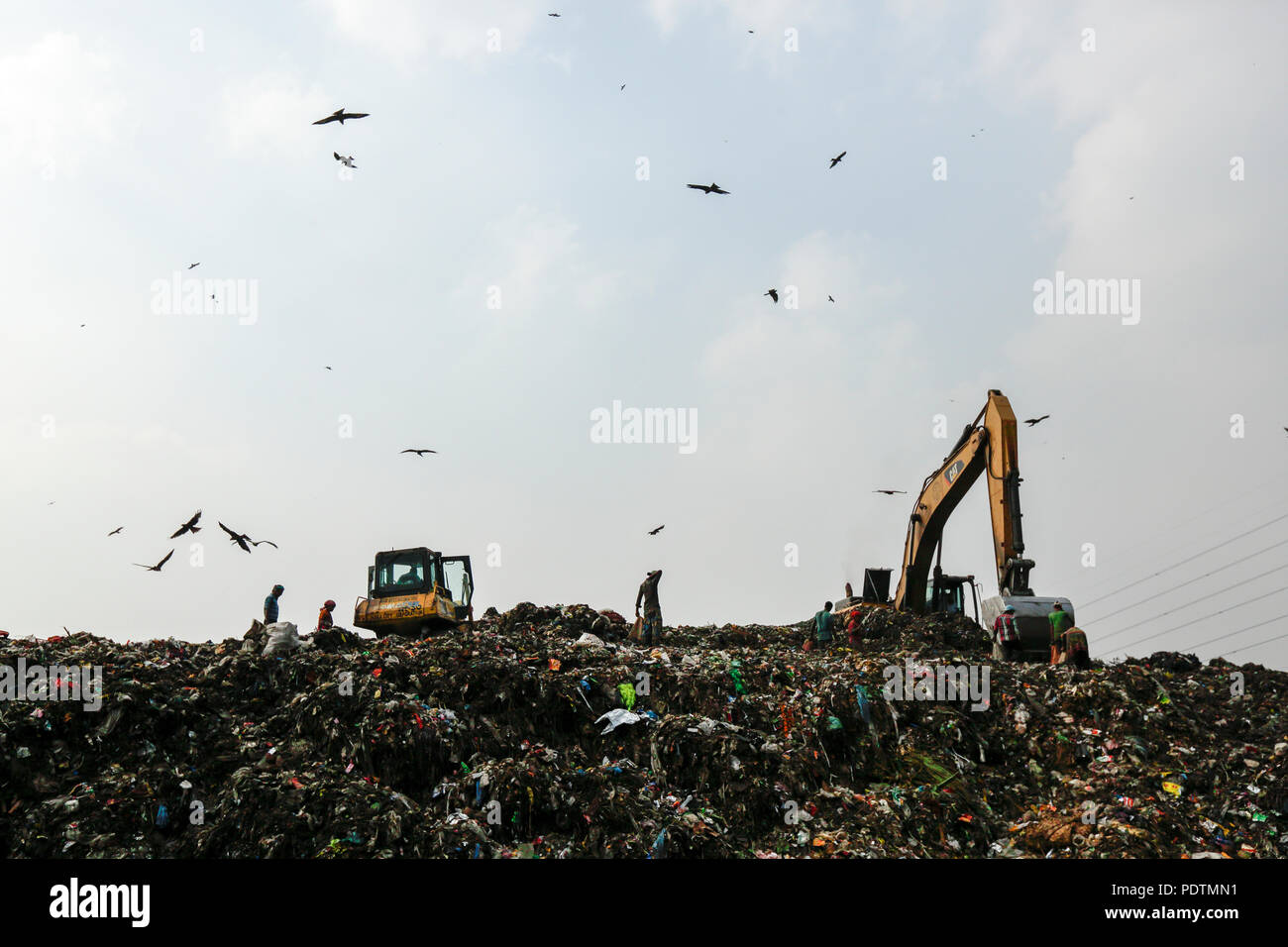 Matuail garbage dump yard in Dhaka, Bangladesh. It received 1500 tones ...