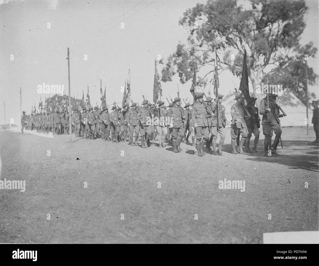 194 SLNSW 9281 Infantry group marching off with their colours Stock ...