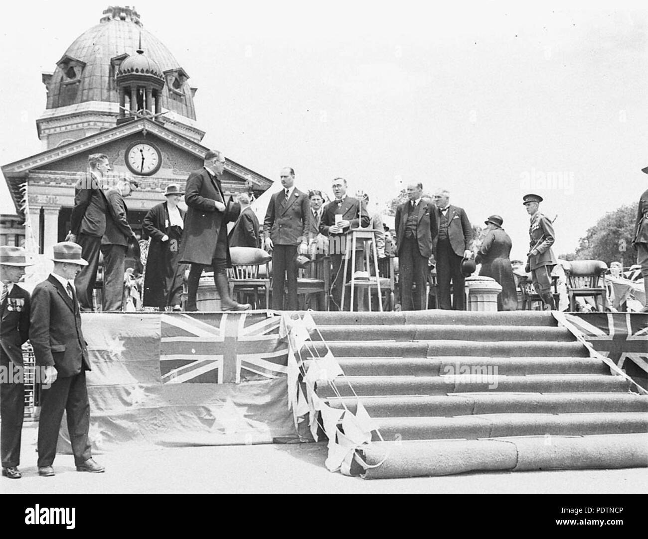 194 SLNSW 9638 Met by member of the clergy on steps of the Court House ...