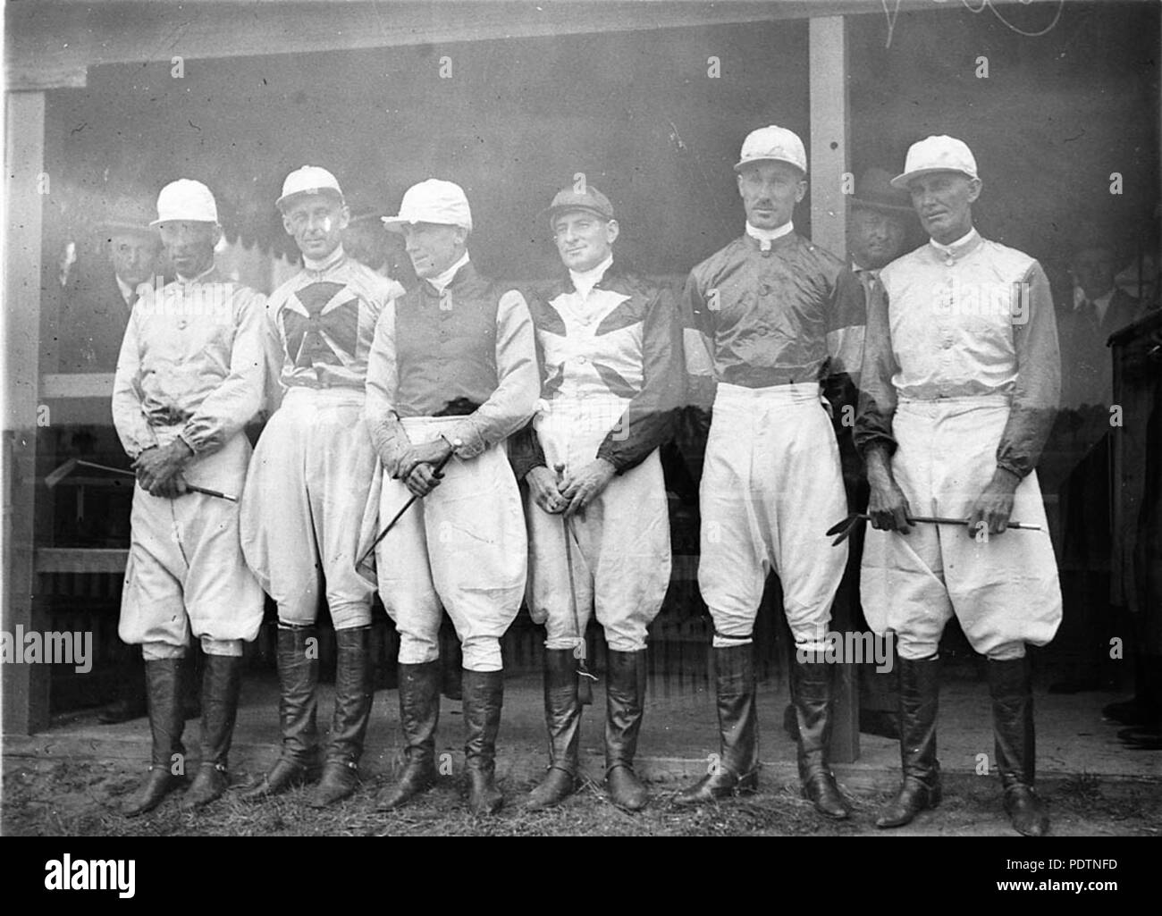 194 SLNSW 9916 Group of the six Cup jockeys Stock Photo - Alamy