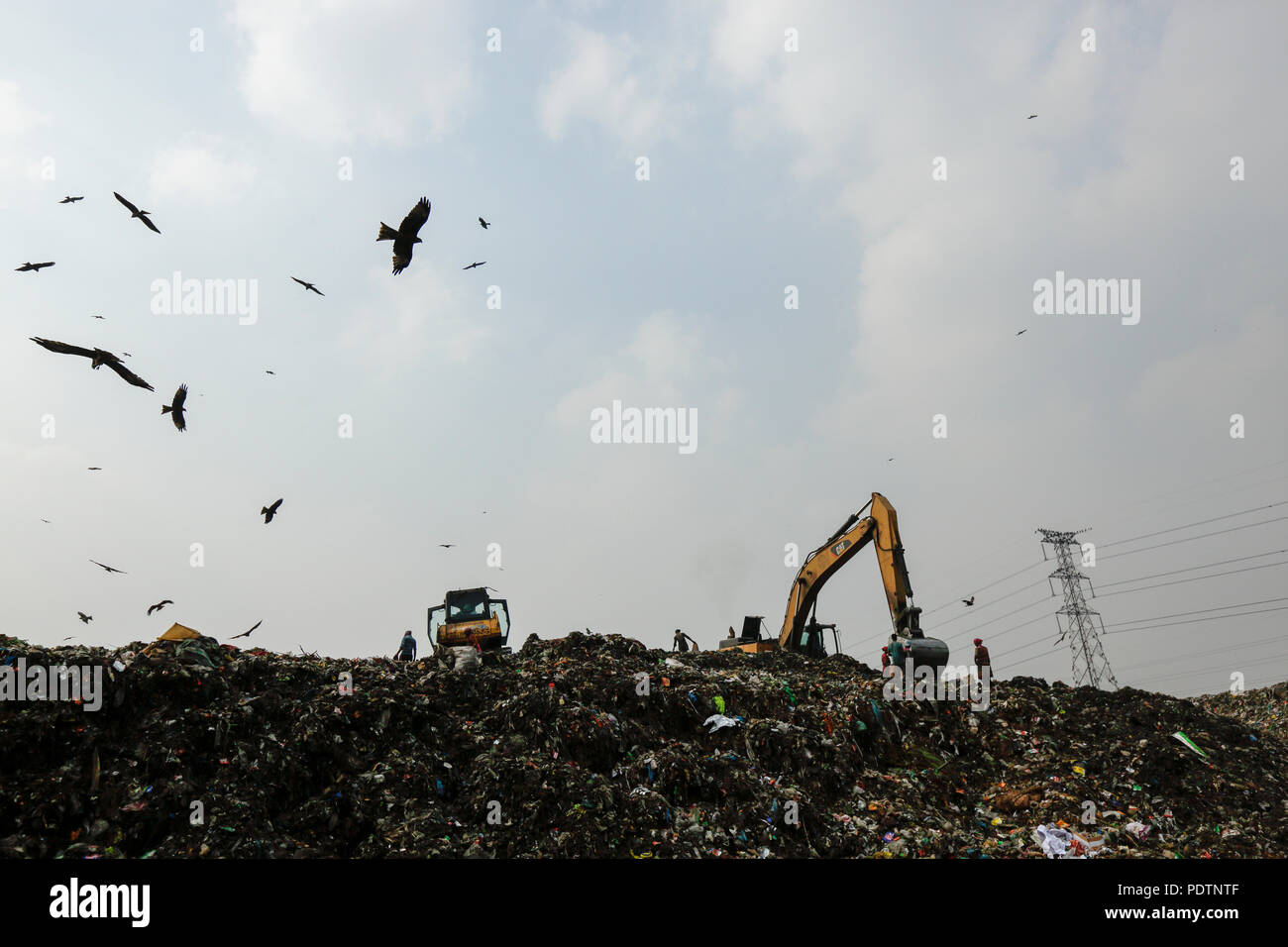 Matuail garbage dump yard in Dhaka, Bangladesh. It received 1500 tones ...