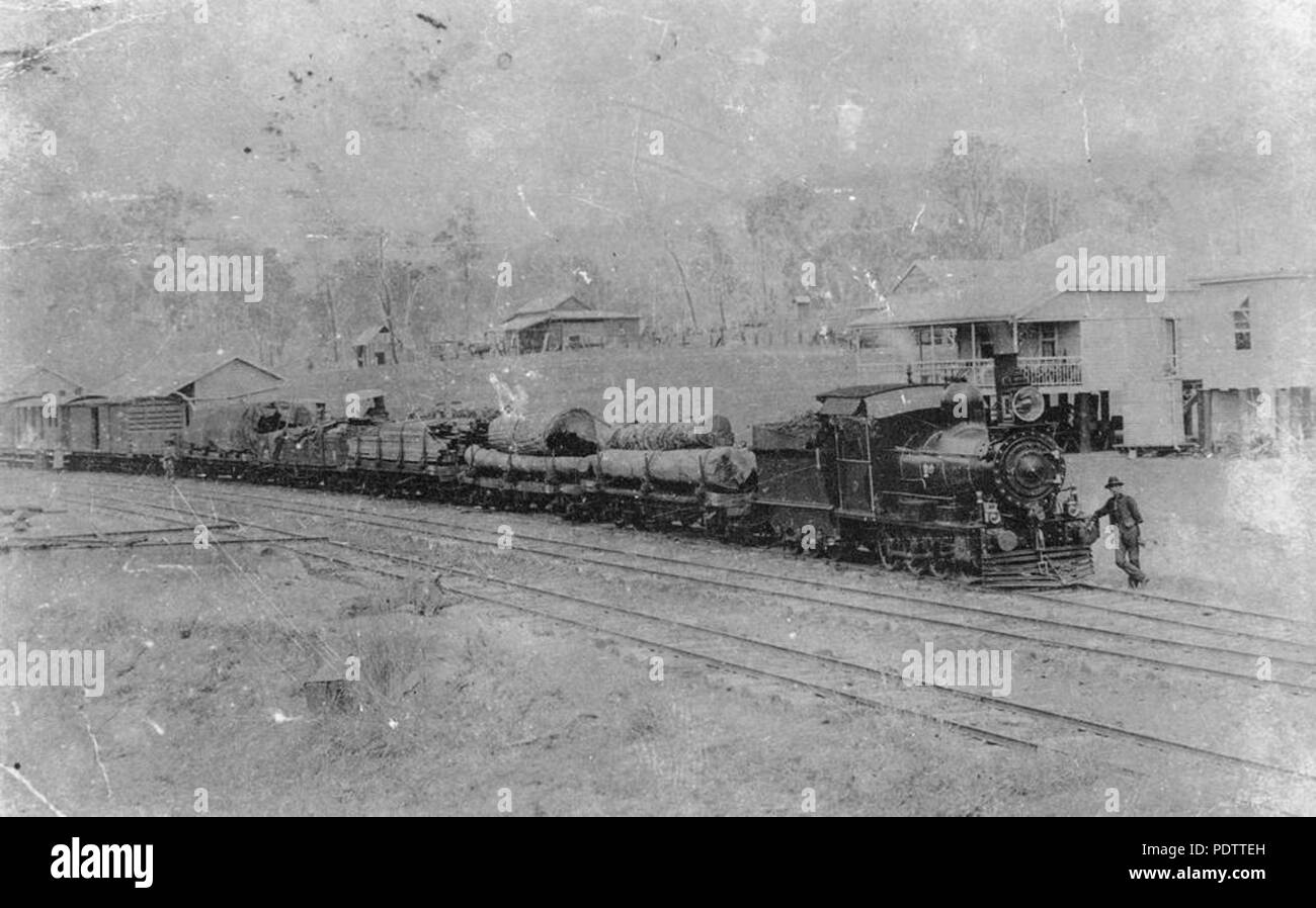 206 StateLibQld 1 111364 Train on the Beaudesert tramway halted at ...
