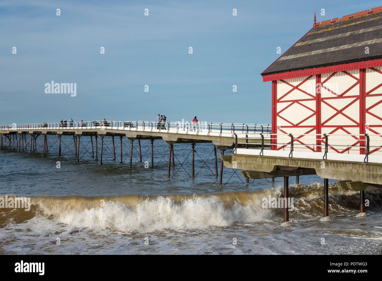 People enjoying a stroll along the old pier at Saltburn-by-the-sea on ...