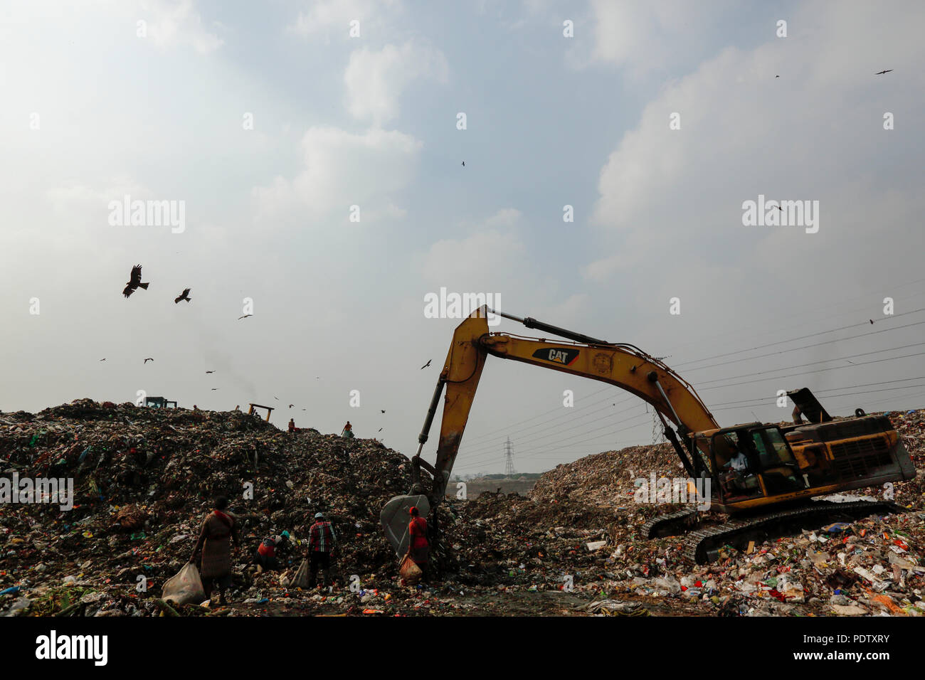 Matuail garbage dump yard in Dhaka, Bangladesh. It received 1500 tones ...