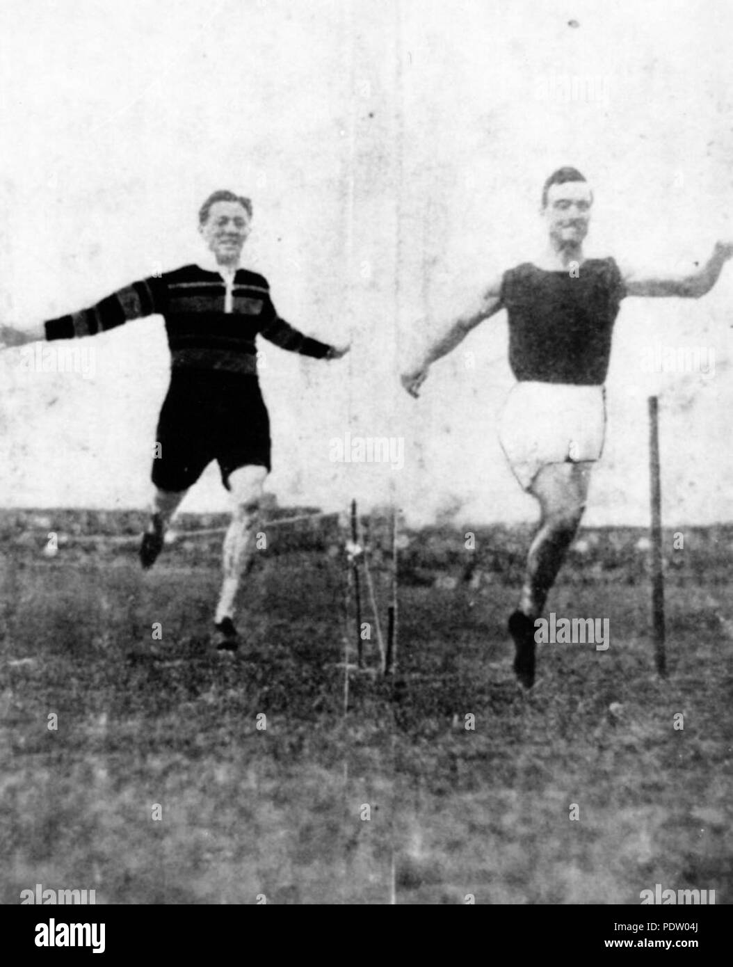 220 StateLibQld 1 135435 Gerald Taylor and Harold Horder completing a ...