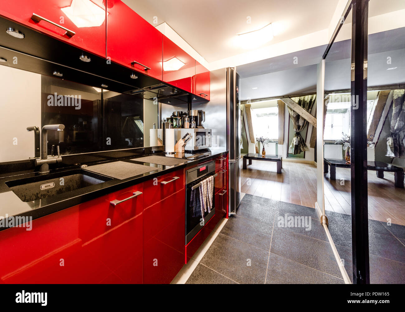 Interior of modern red kitchen Stock Photo - Alamy