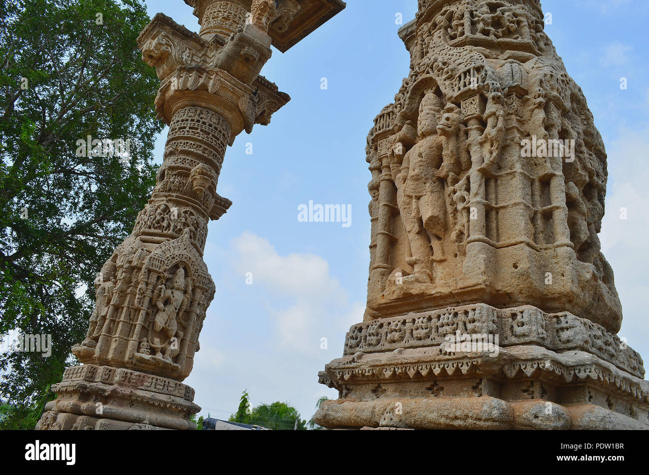 Carved old hindu temple arched gate in india Stock Photo - Alamy
