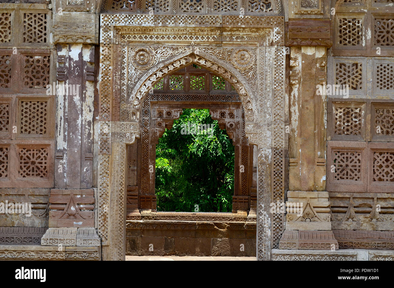 Ancient carved ruined islamic mosque in india made up of rocks and ...