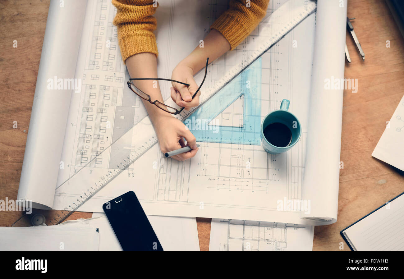 Top view of architect drawing on architectural project Stock Photo - Alamy
