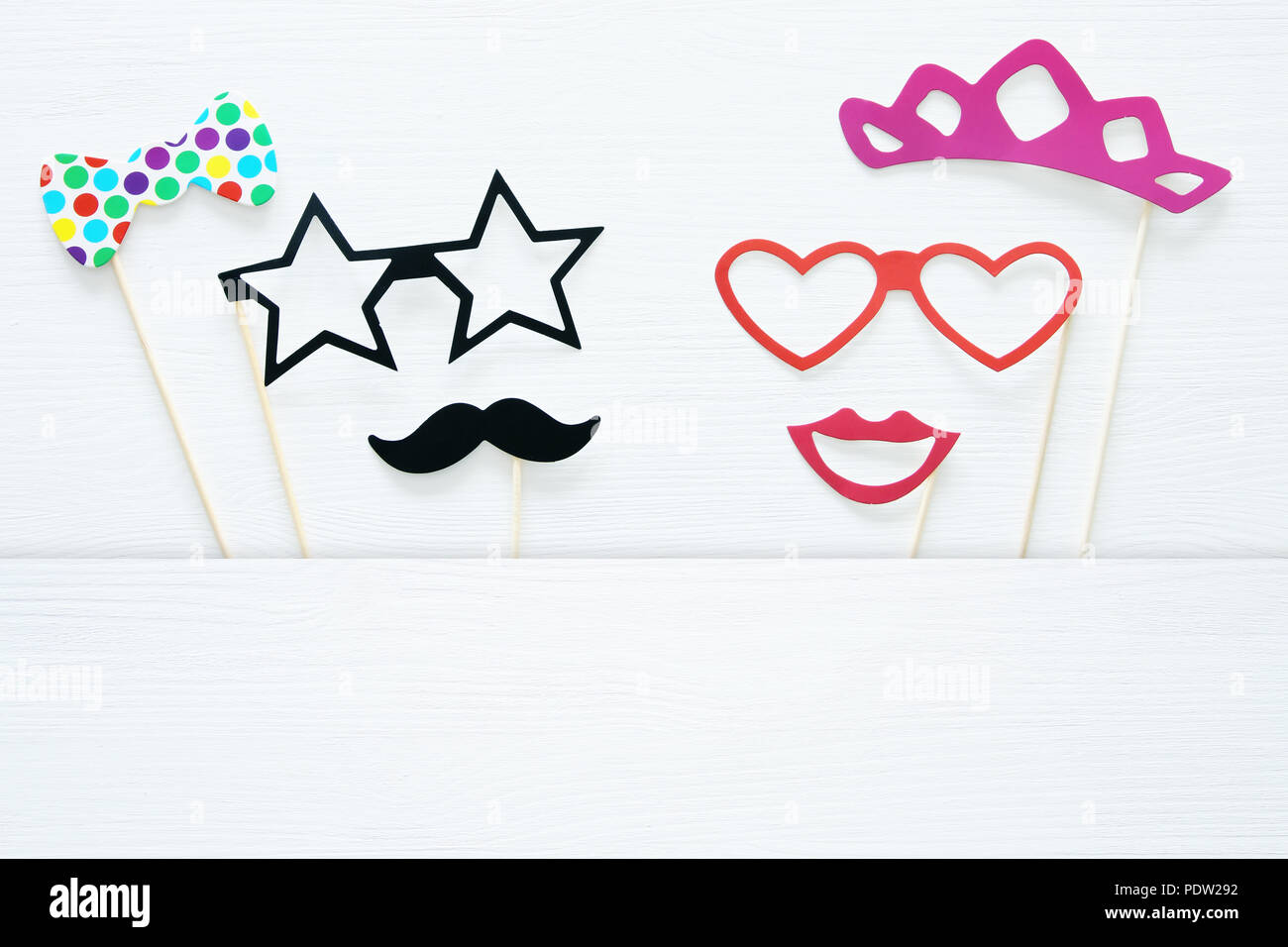 Top view image of funny and colorful photo booth props for party over ...