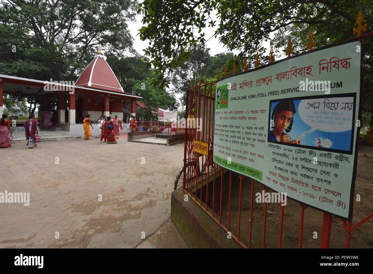 A Bengali banner discourages the child marriage here at the Kankalitala ...
