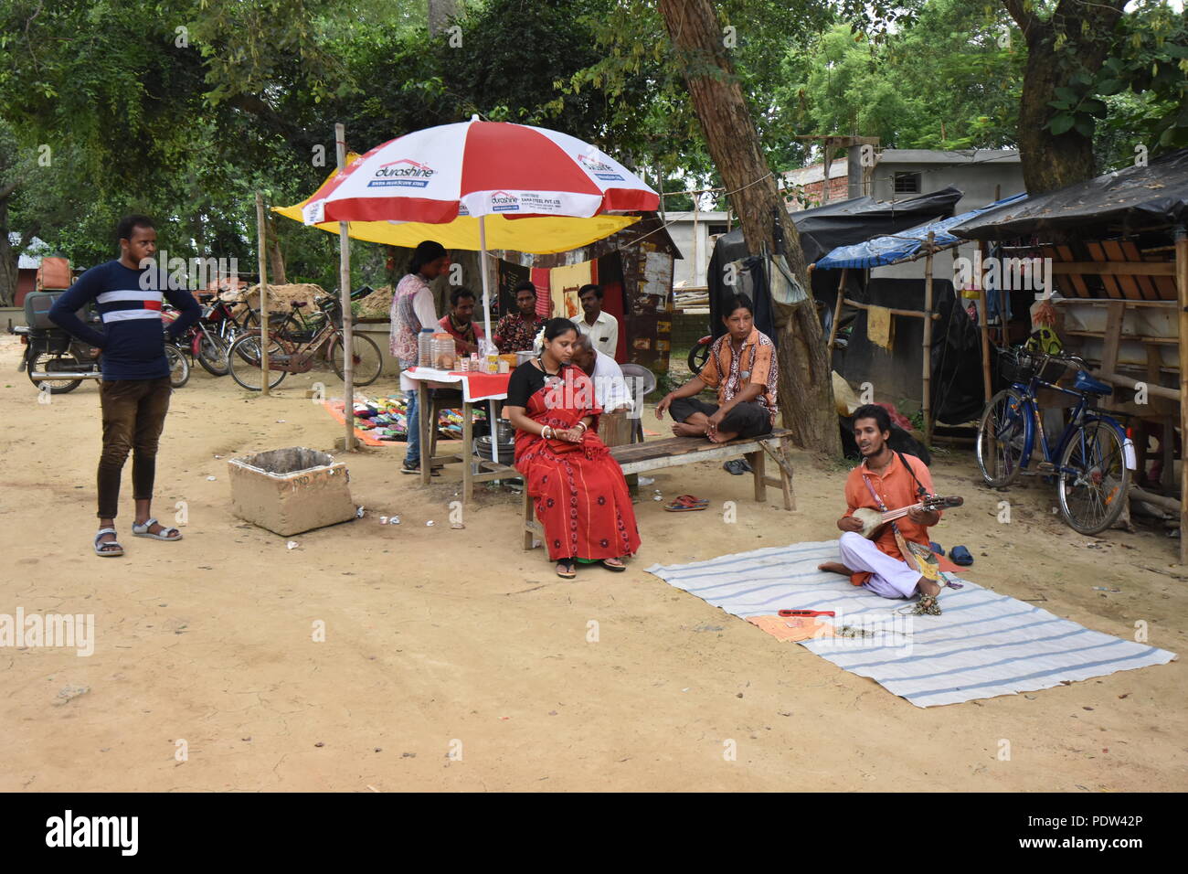 A Baul singer performs at the Kankalitala mandir complex near Prantik ...