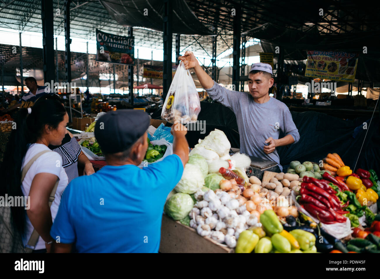 People on the Osh bazaar in Bishkek Stock Photo - Alamy