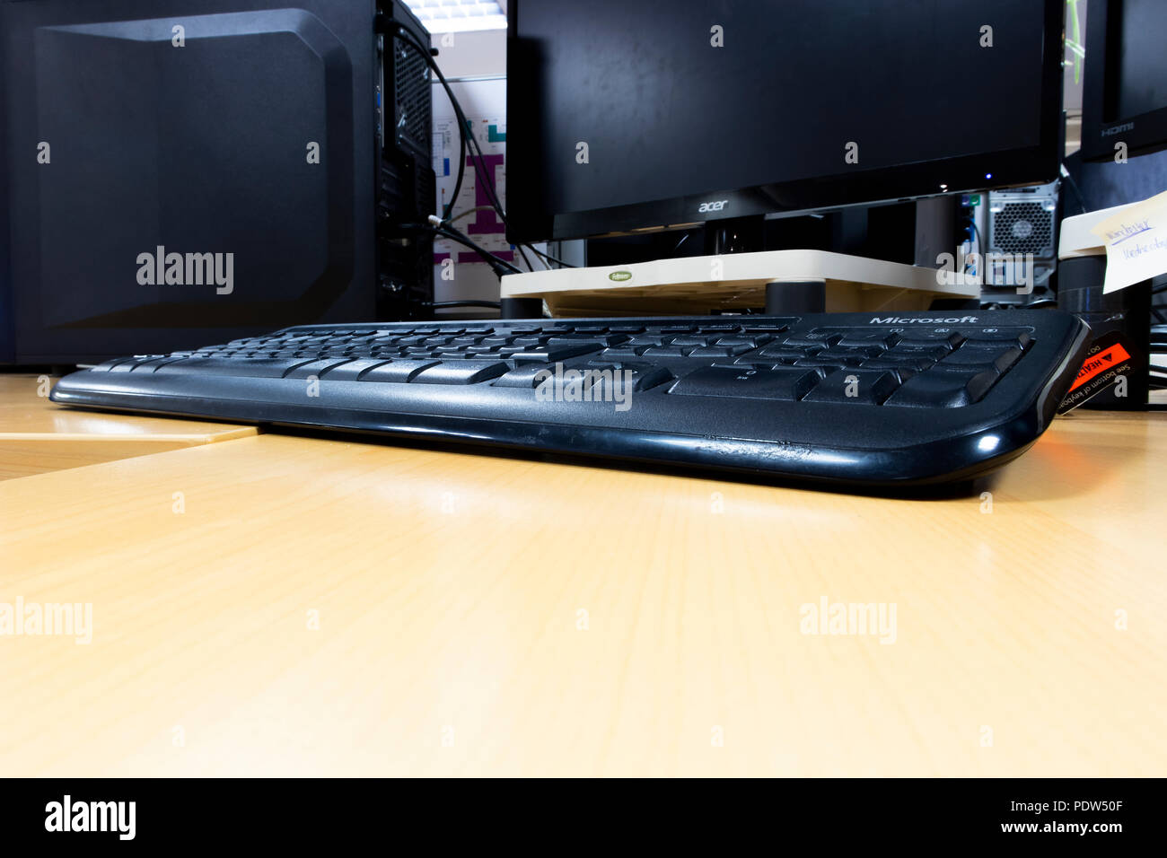 business desk office interior with keyboard to computer workstations ...