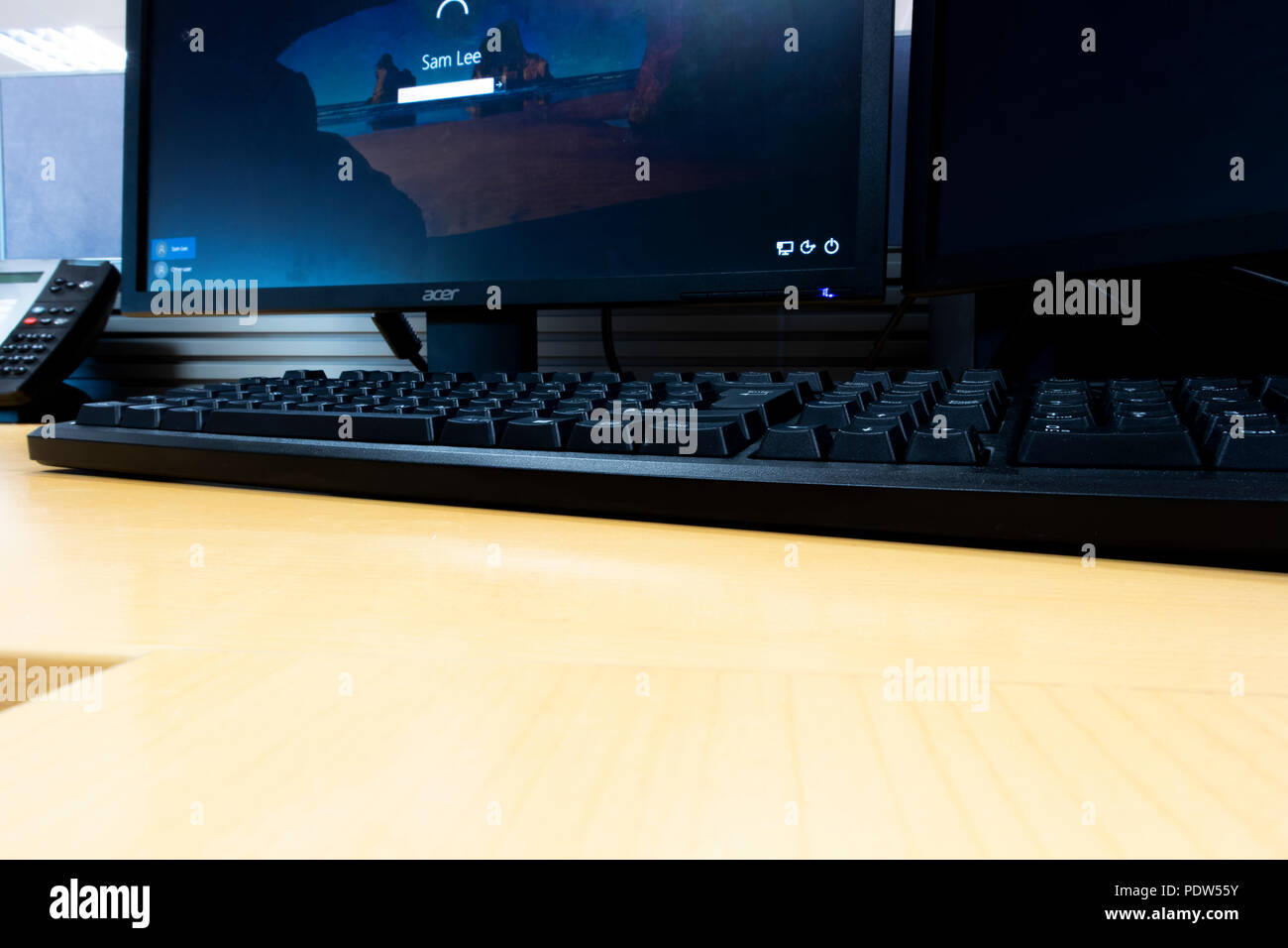 business desk office interior with keyboard to computer workstations ...