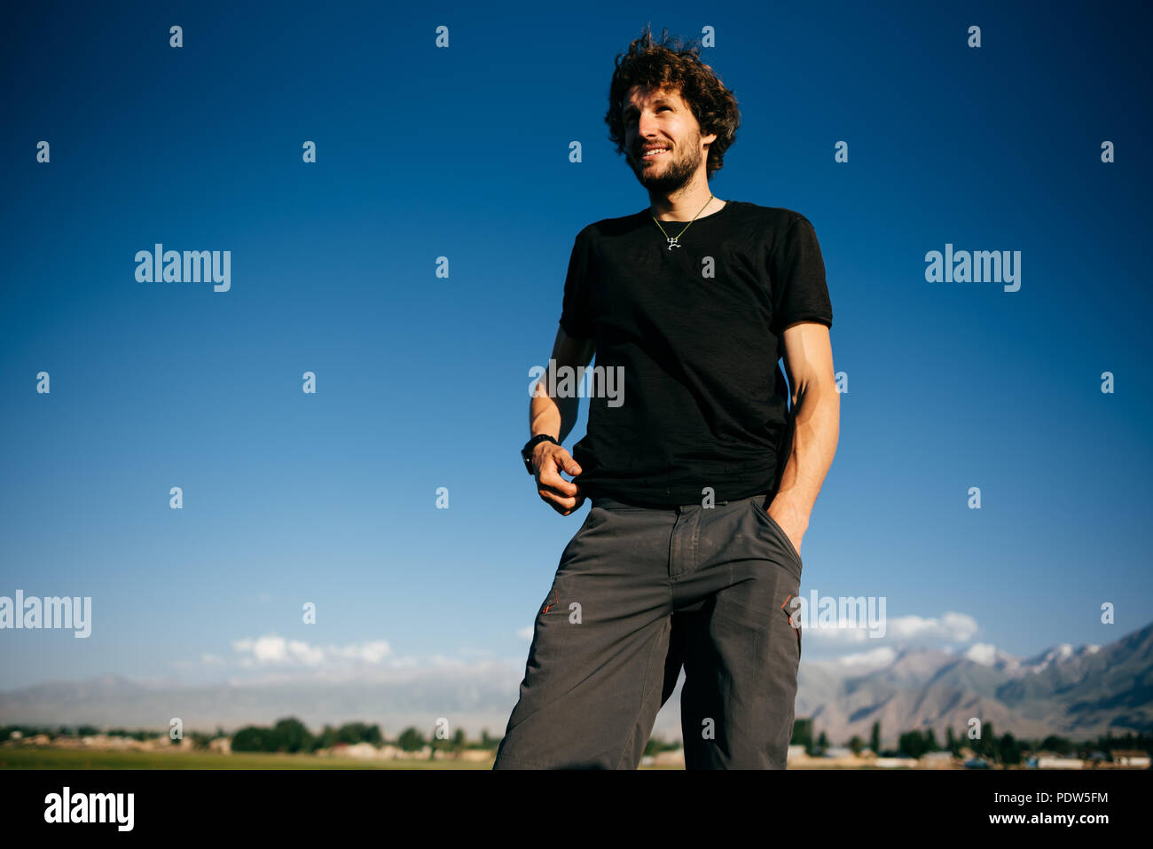 A man walking around nature and taking photos Stock Photo - Alamy