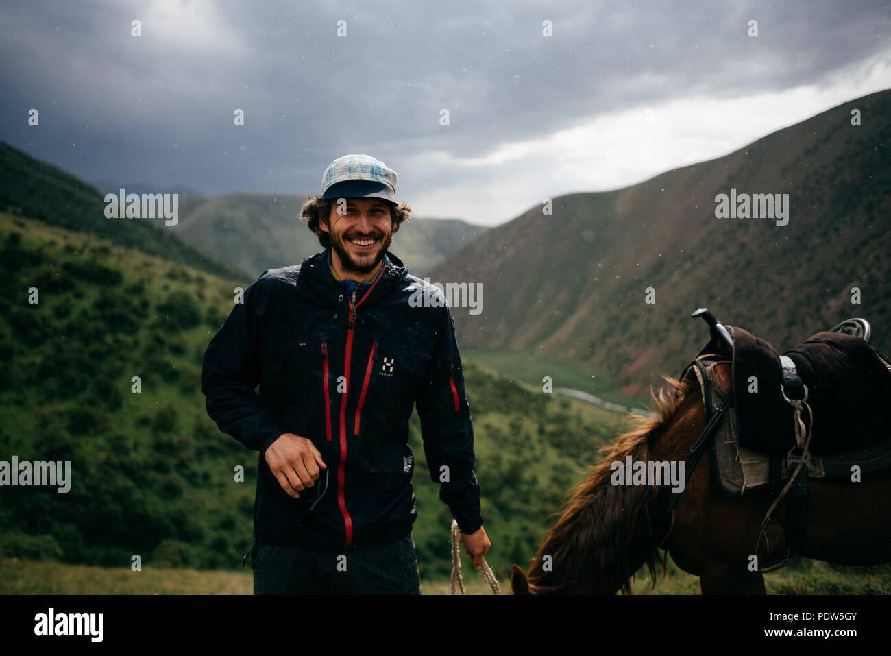 A man walking around nature and taking photos Stock Photo - Alamy