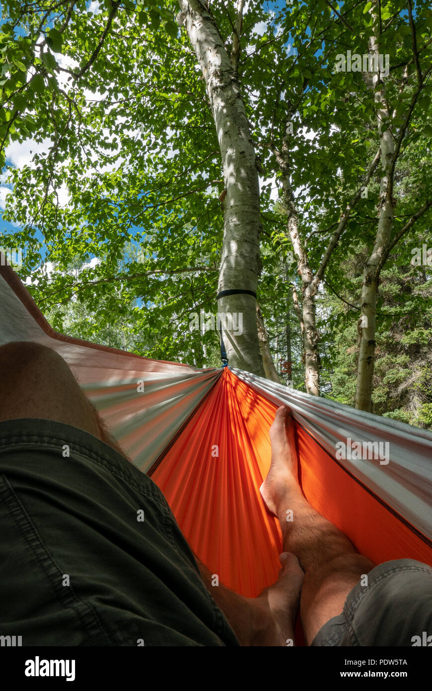People relaxing under shade tree hi-res stock photography and images ...