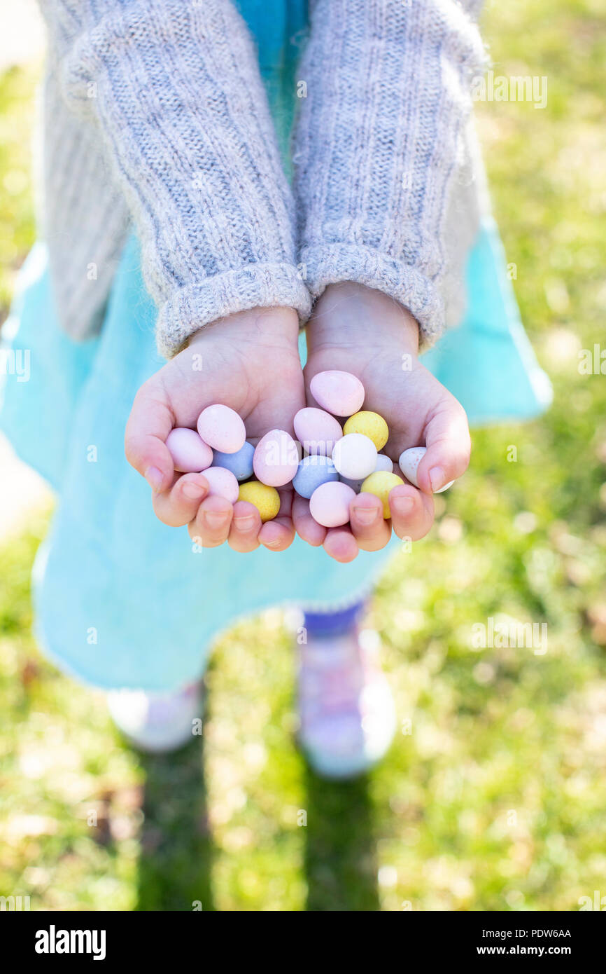 Child holding candy Stock Photo - Alamy