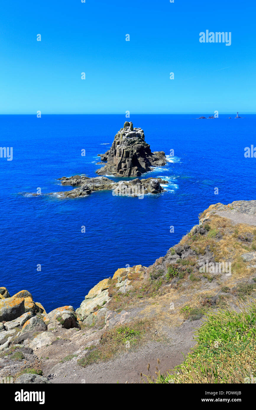 Armed Knight sea stack and distant Longships Lighthouse off Land's End ...