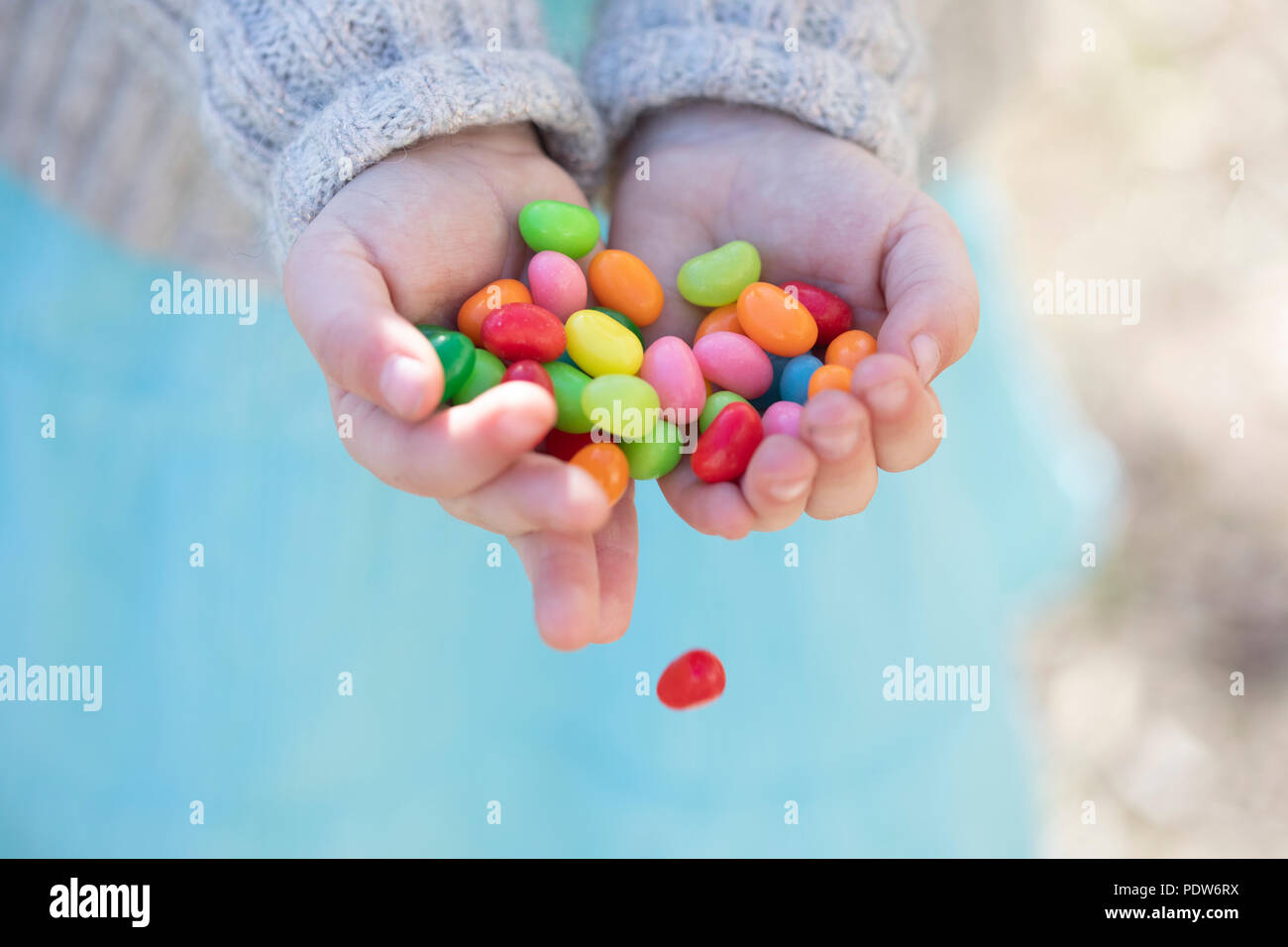 Child eating jelly candy hi-res stock photography and images - Alamy