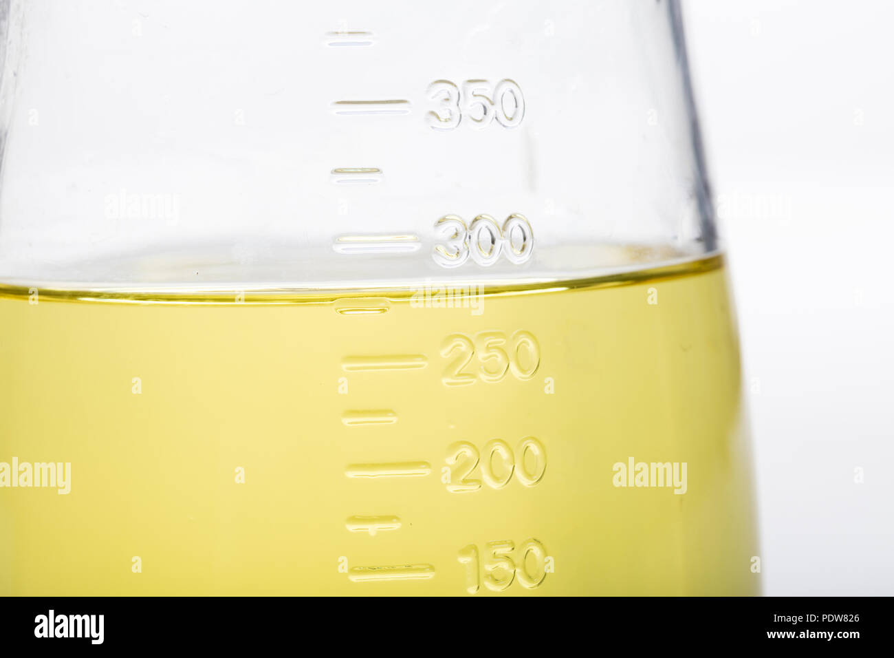 Cooking Oil on measuring cup close up shot Stock Photo - Alamy