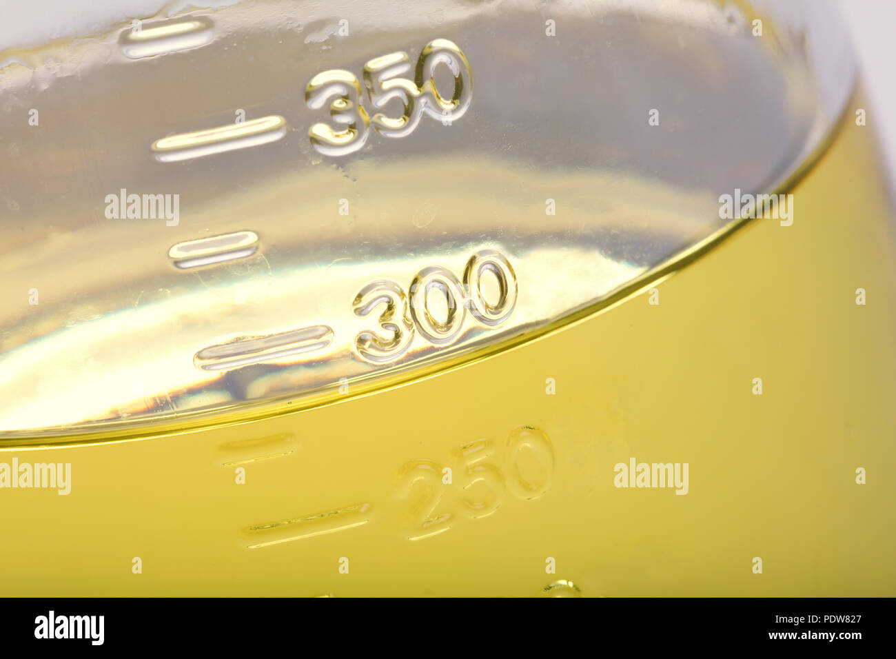 Cooking Oil on measuring cup close up shot Stock Photo - Alamy