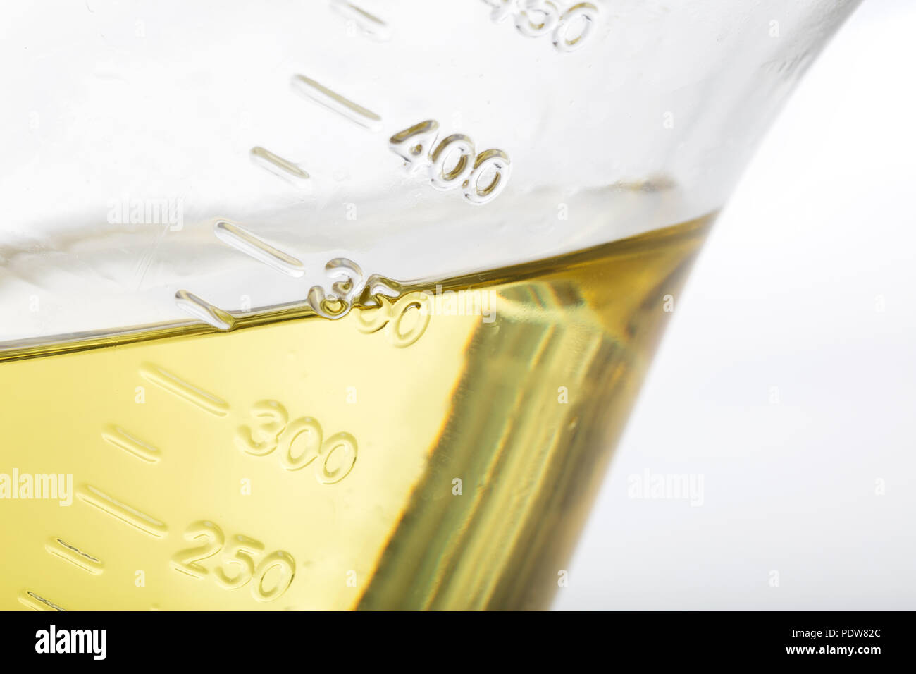 Cooking Oil on measuring cup close up shot Stock Photo - Alamy
