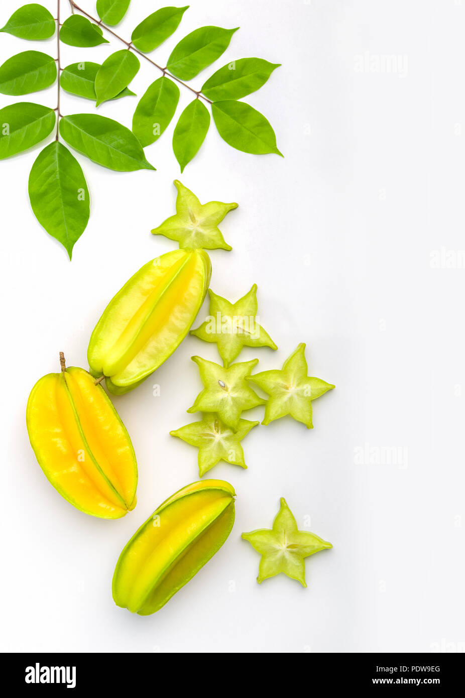 Yellow green star carambola or star apple ( starfruit ) on white ...