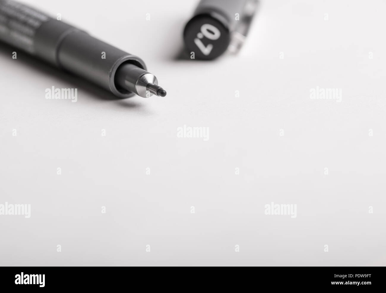 Close-up drawing pen on while background Stock Photo - Alamy