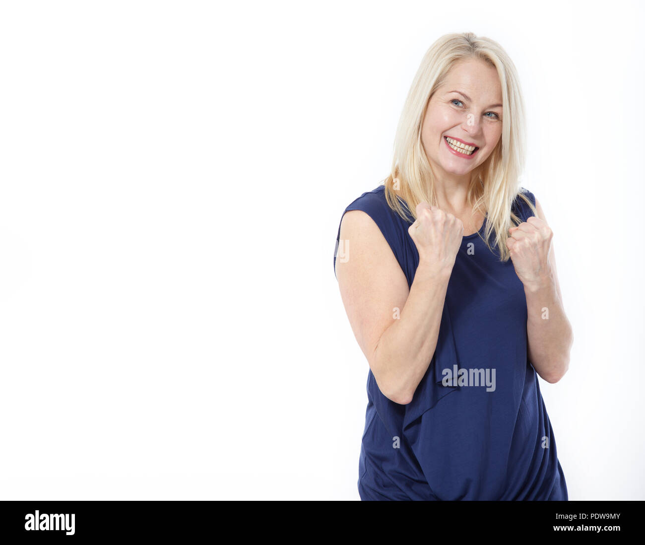 Happy middle aged woman victory sign. Beautiful middle aged woman over ...