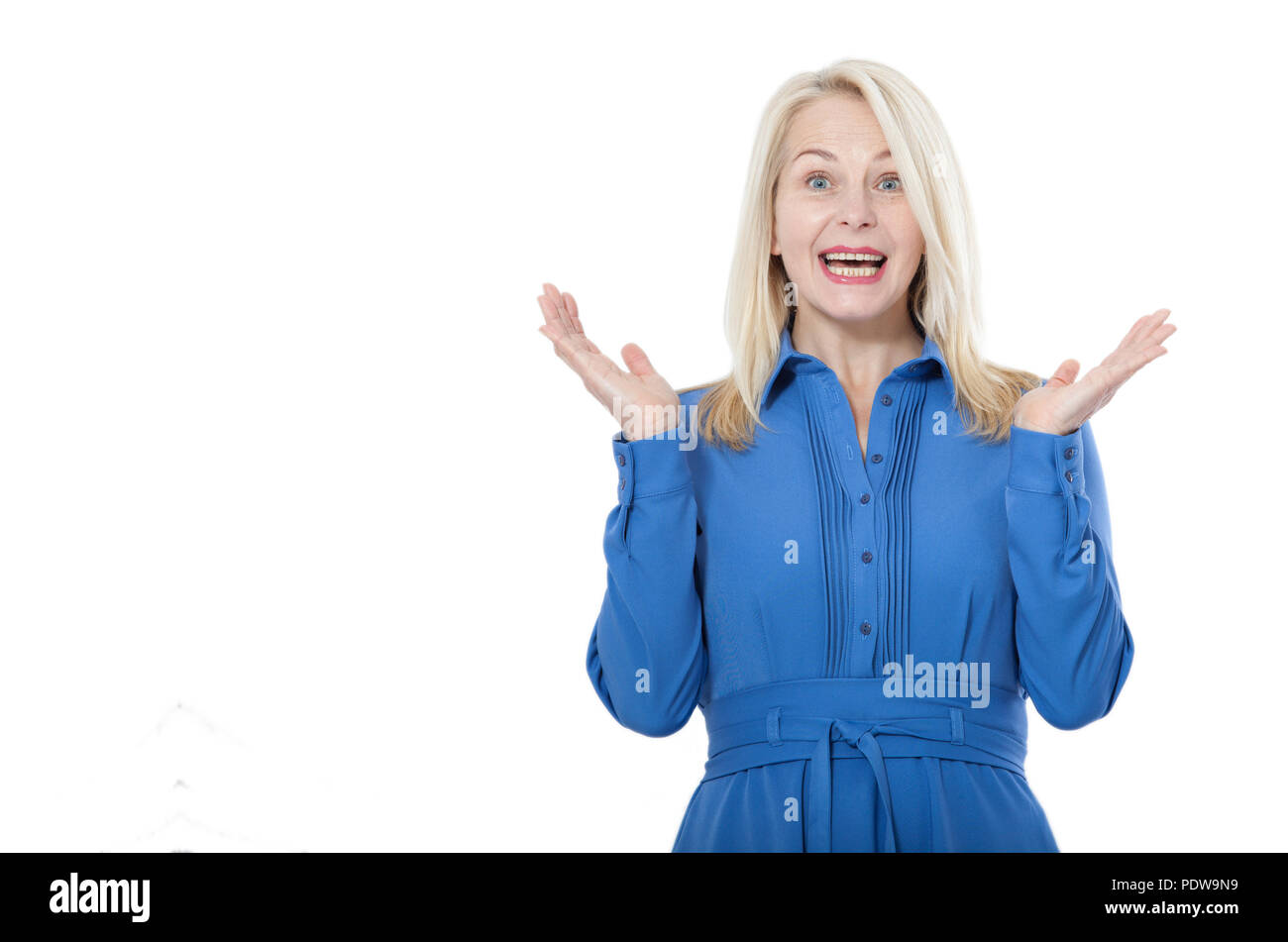 Surprised middle aged woman over white background. Human face ...